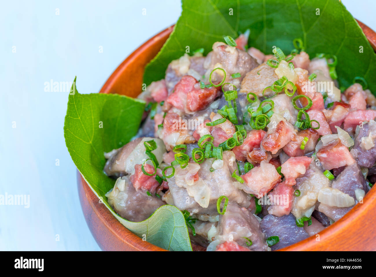 A simple Hawaiian hash made with local taro, thick bacon, green onions ...