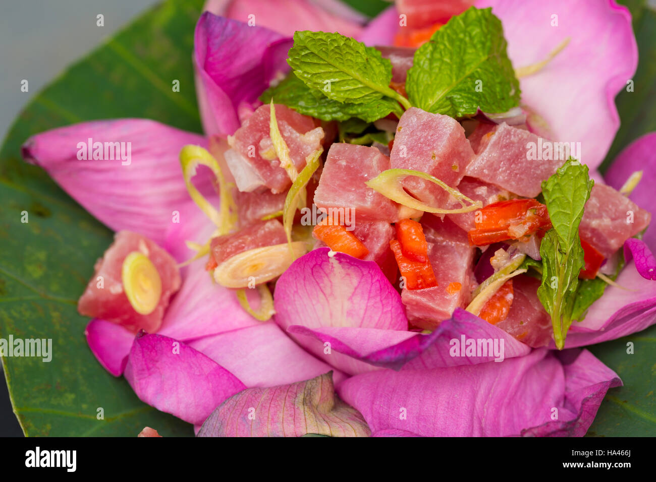Thai ahi tuna salad served in a beautiful lotus flower Stock Photo - Alamy