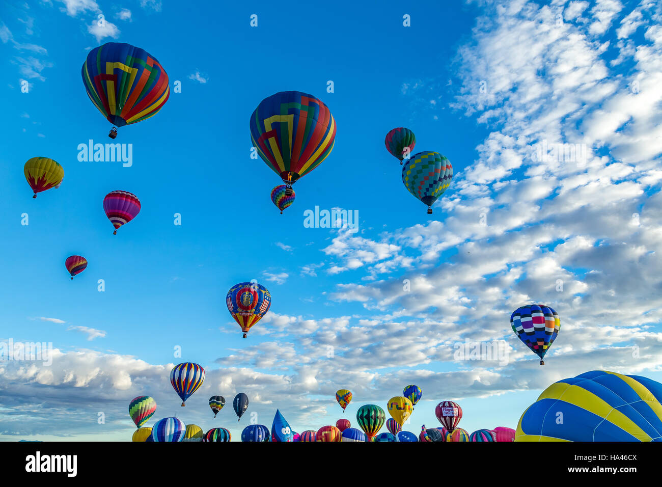 Hot Air Balloons fly over the city of Albuquerque, New Mexico during ...