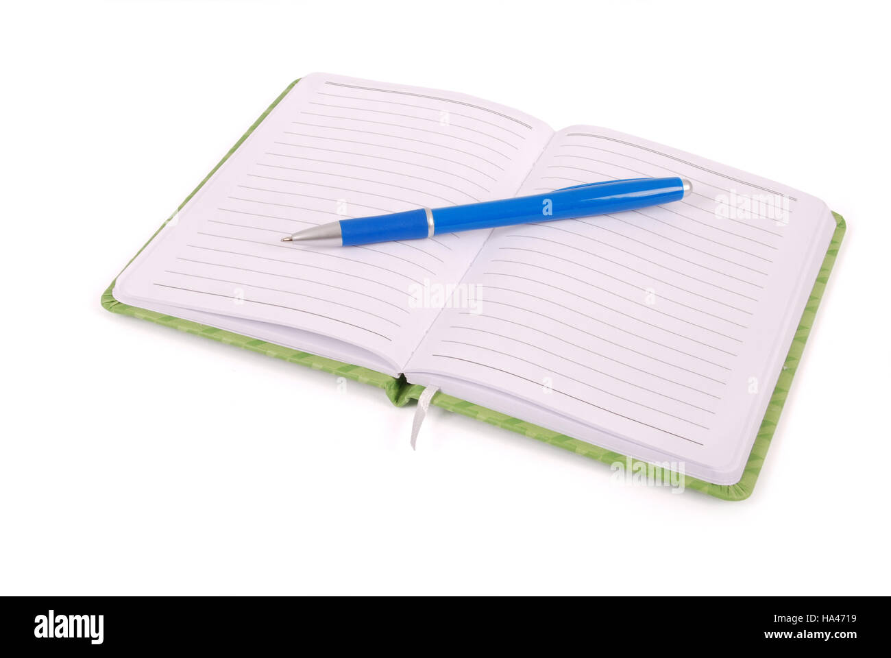 Green open notebook with the blue handle facing right angle to us ...