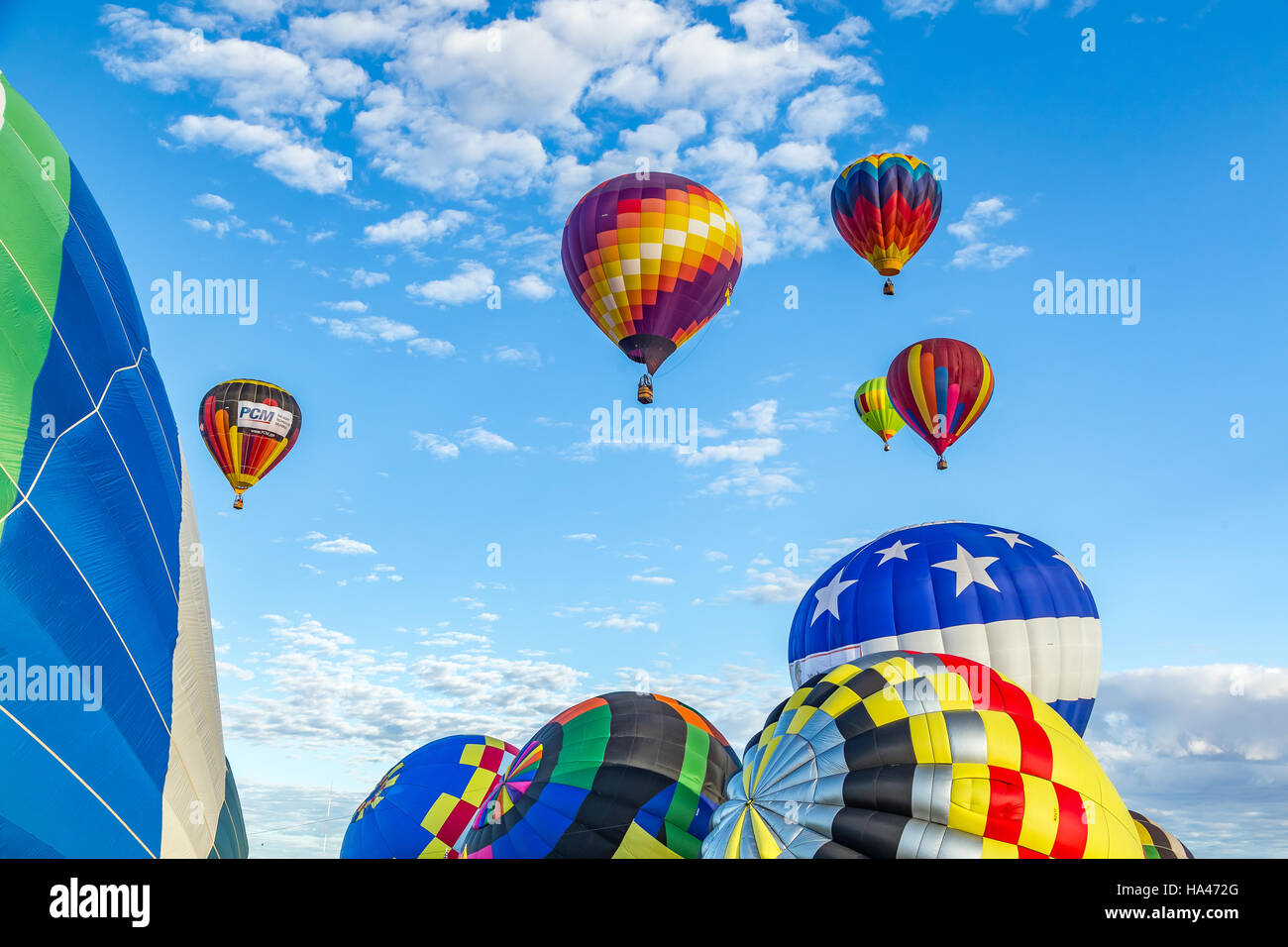 Hot Air Balloons fly over the city of Albuquerque, New Mexico during ...