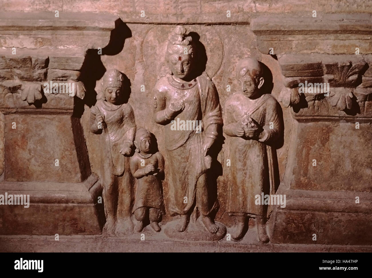 Standing Buddha and group. Hadda tepe shuter, stupa 27. Afghanistan ...