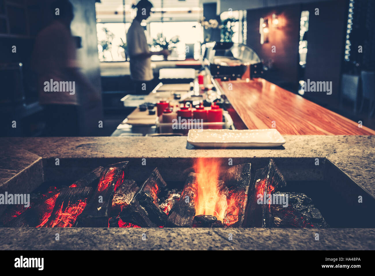 modern restaurant with fireplace Stock Photo - Alamy