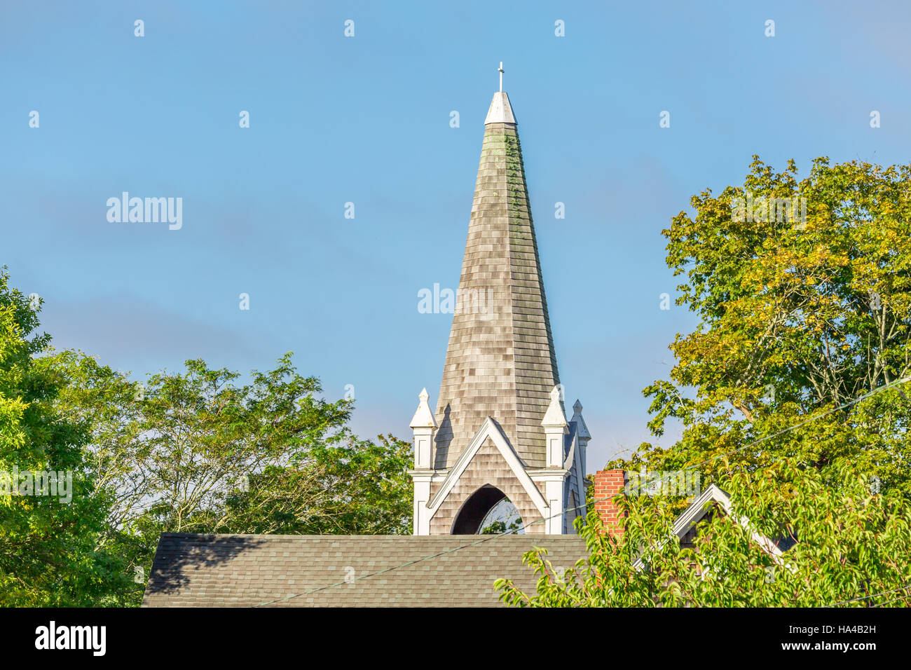 church steeple with trees and sky Stock Photo - Alamy
