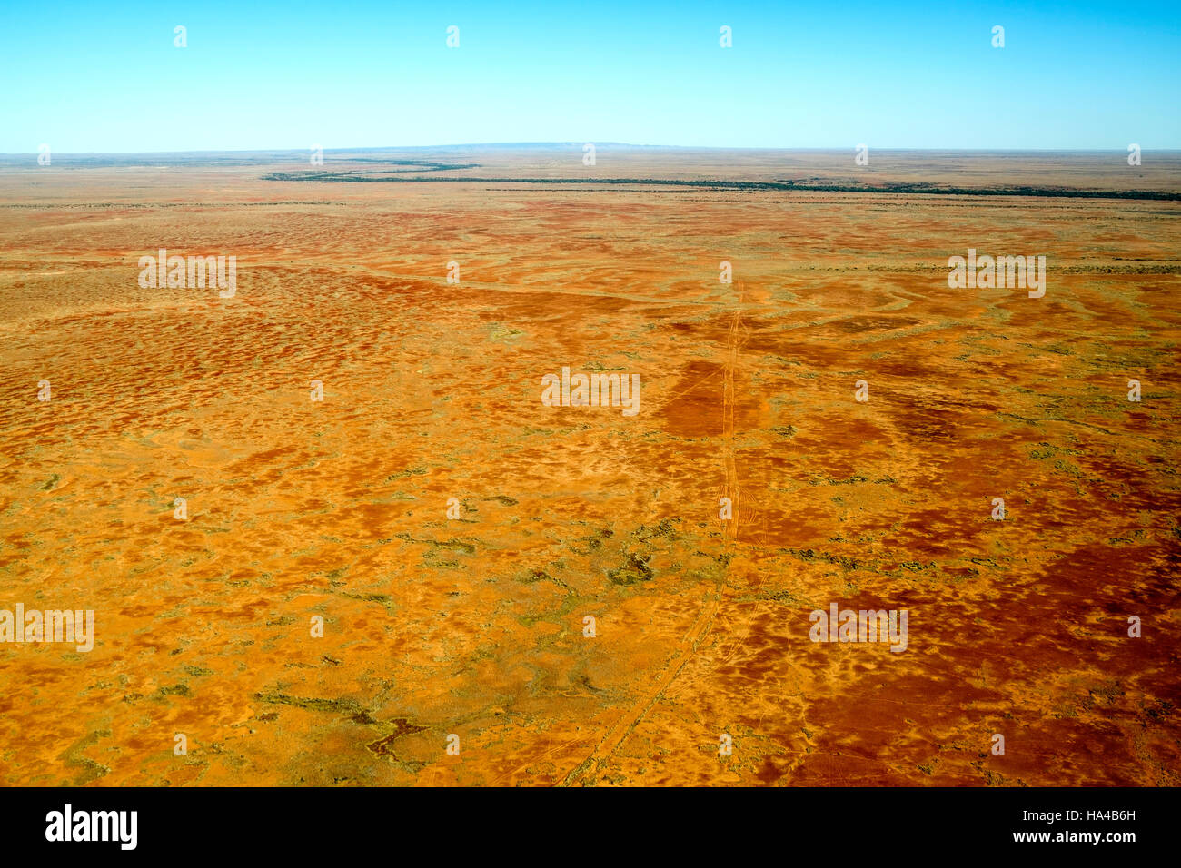 An aerial view of creeks cutting through the parched Australian Outback ...