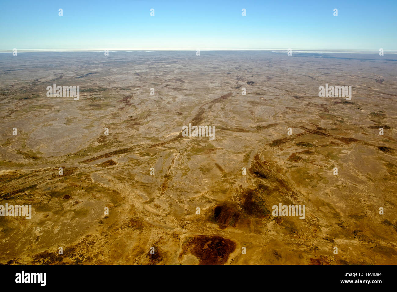 An aerial view of creeks cutting through the parched Australian Outback ...