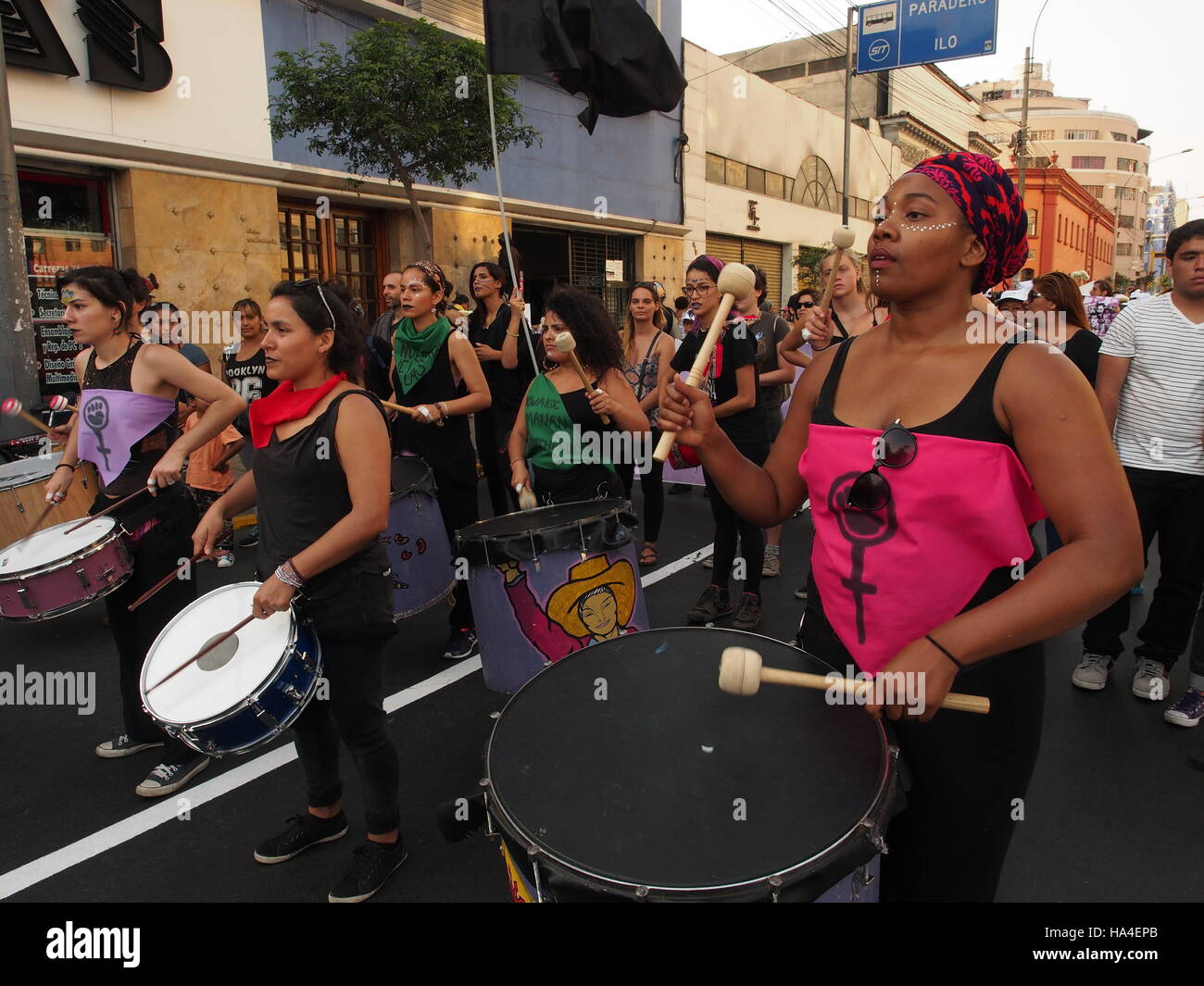 Lima, Peru. 26th Nov, 2016. Women activists march and protest in front ...