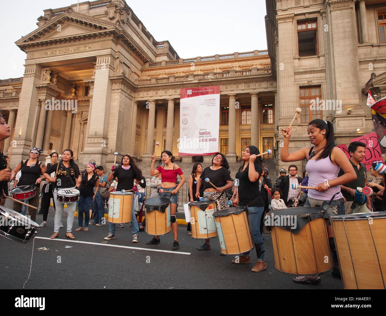 Lima, Peru. 26th Nov, 2016. Women activists march and protest in front ...
