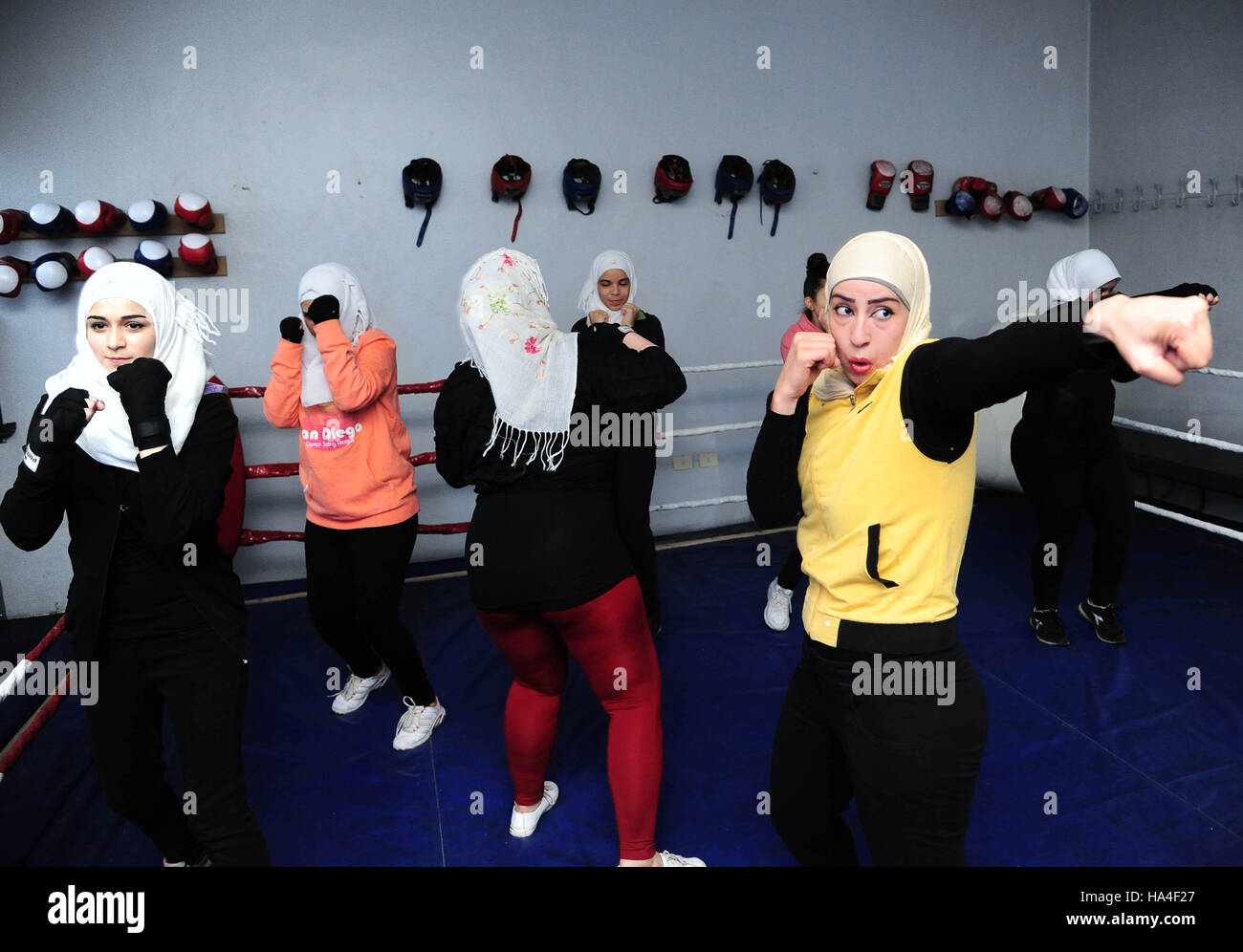 Beijing, Syria, China. 19th Nov, 2016. Syrian women boxers exercise at ...
