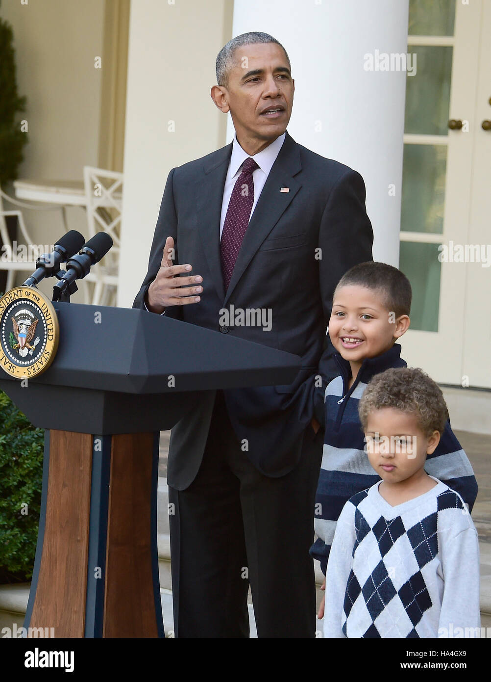 United States President Barack Obama, left, joined by nephews Austin ...