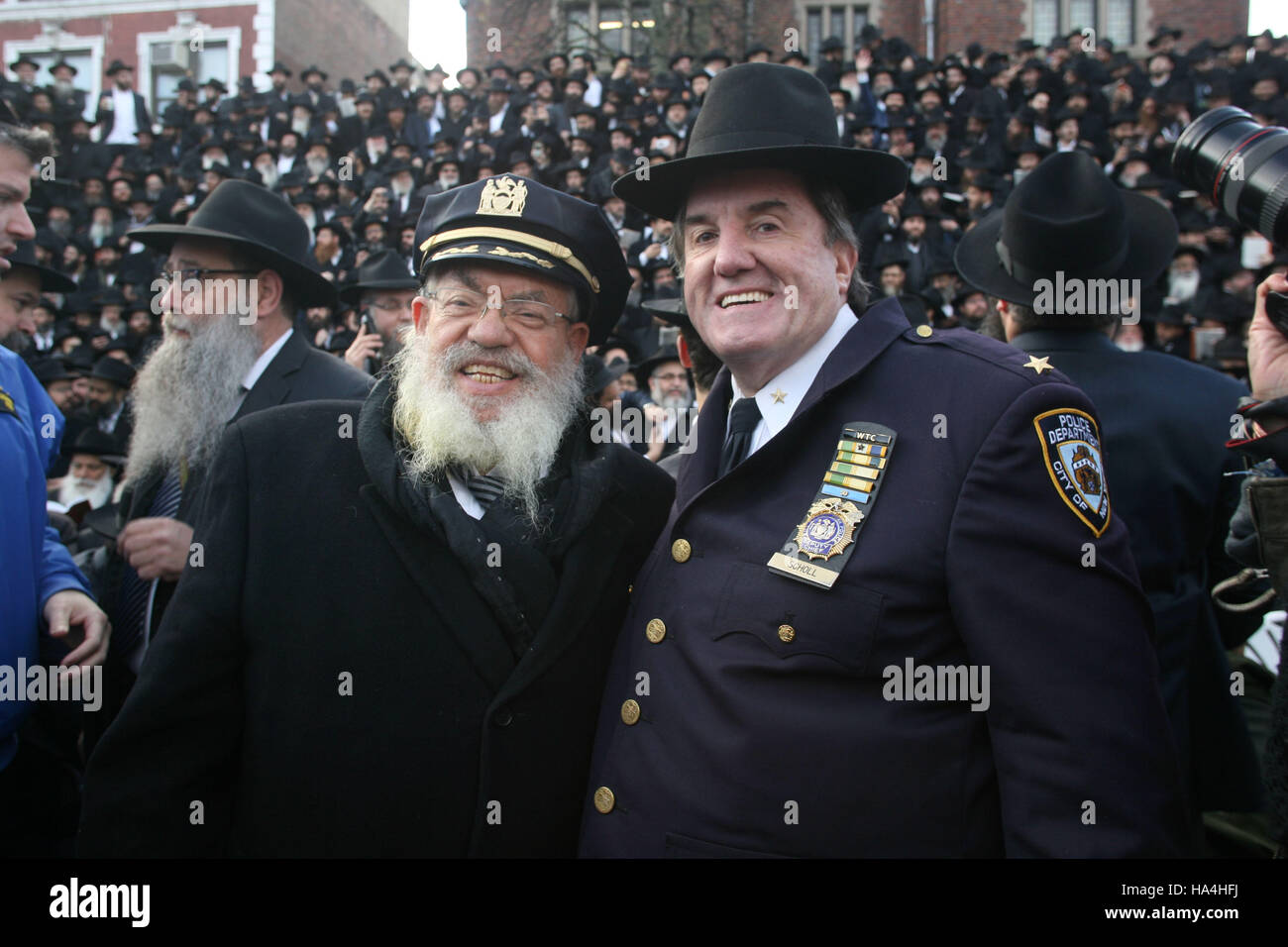 New York, New York, USA. 27th Nov, 2016. Rabbis are seen among a sea of ...