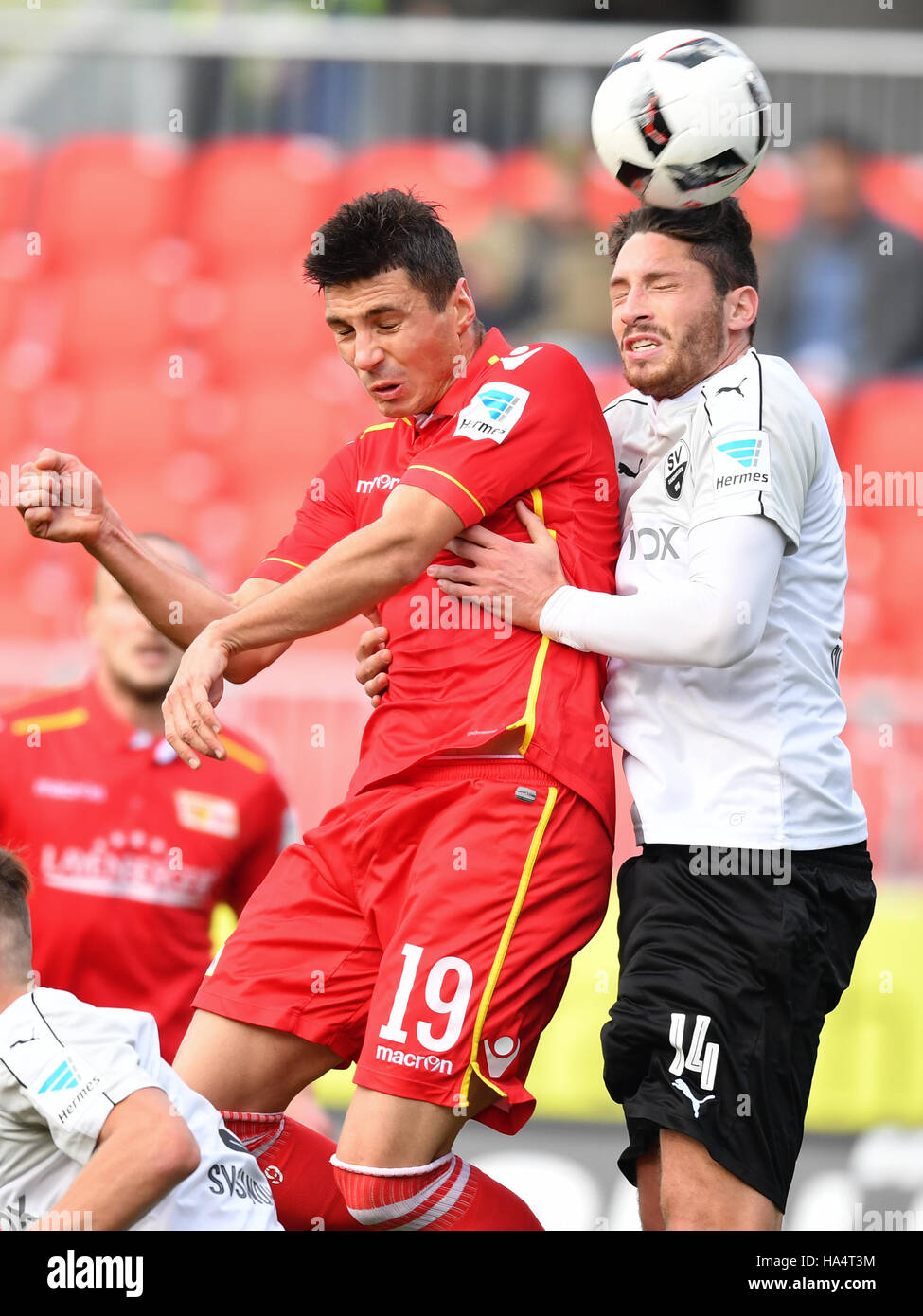 Sandhausen, Germany. 27th Nov, 2016. Berlin's Damir Kreilach (L) and ...