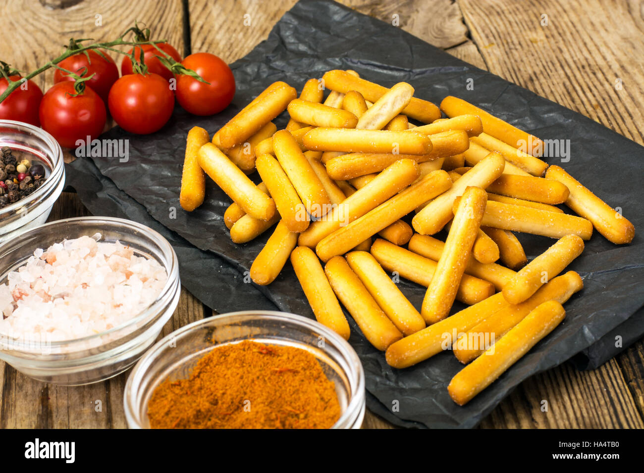 Crispy bread sticks with salt and spices. Studio Photo Stock Photo - Alamy