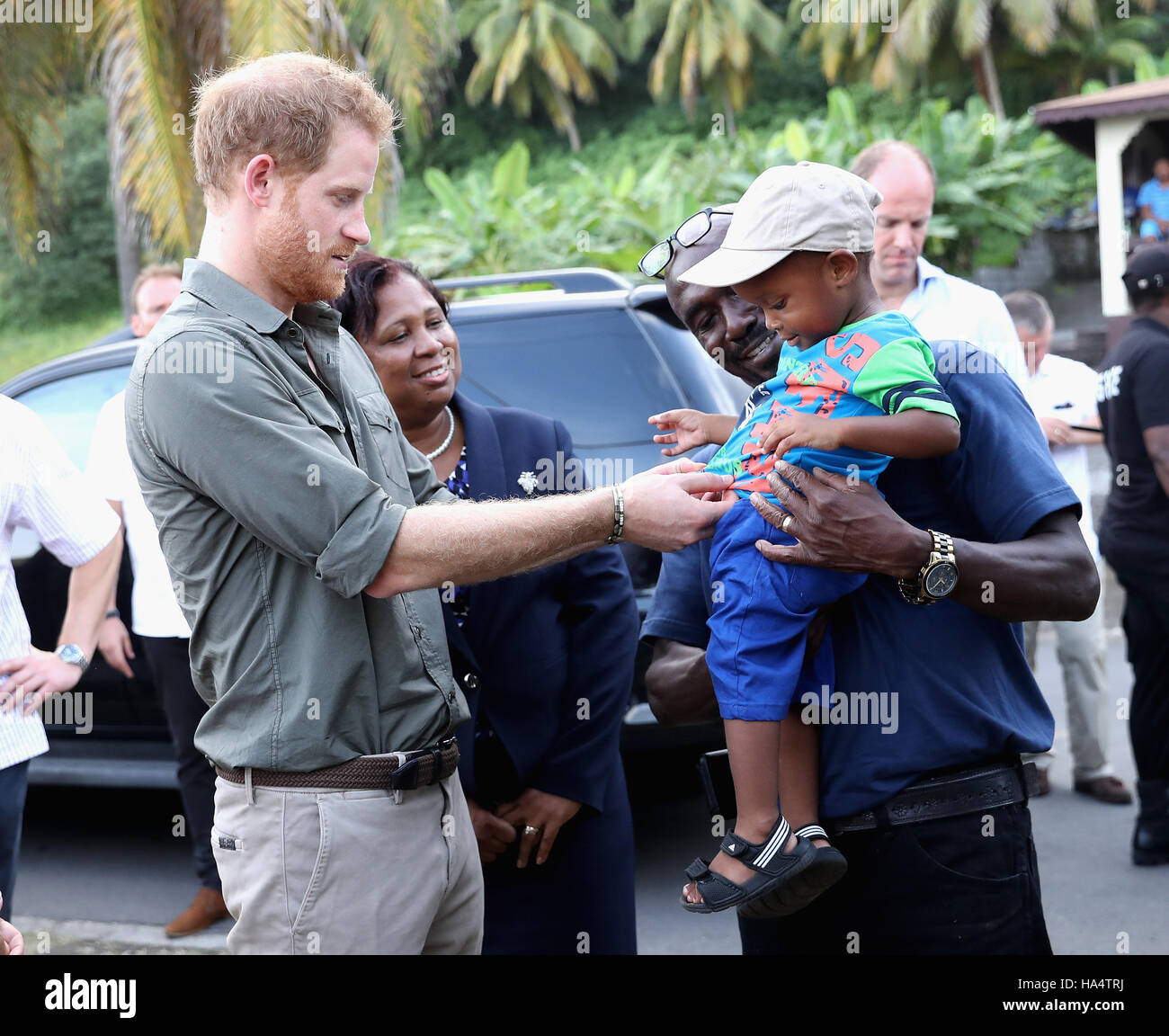 Prince Harry meets Jyasi Junior Nash, two, during a visit to a Turtle ...