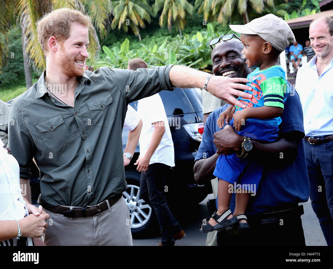 Prince Harry meets Jyasi Junior Nash, two, during a visit to a Turtle ...