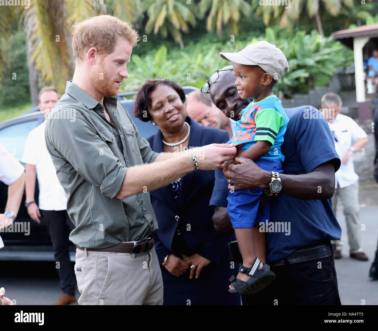 Prince Harry meets Jyasi Junior Nash, two, during a visit to a Turtle ...