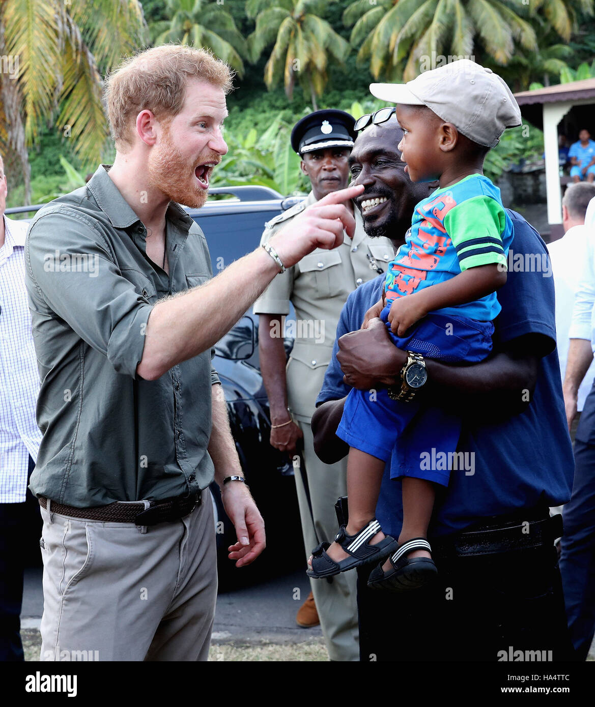 Prince Harry meets Jyasi Junior Nash, two, during a visit to a Turtle ...