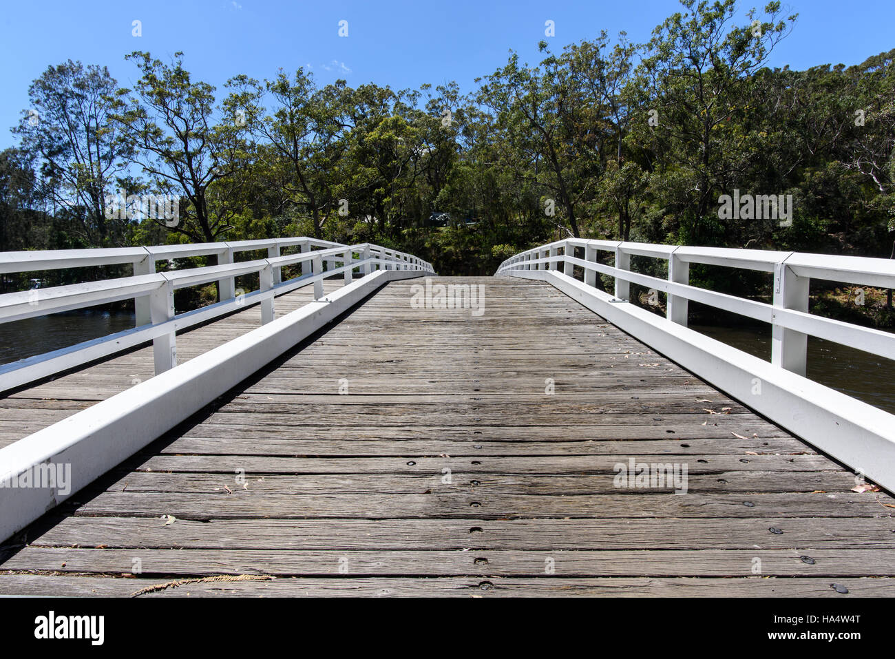Old Wooden Bridge over a lake Stock Photo - Alamy