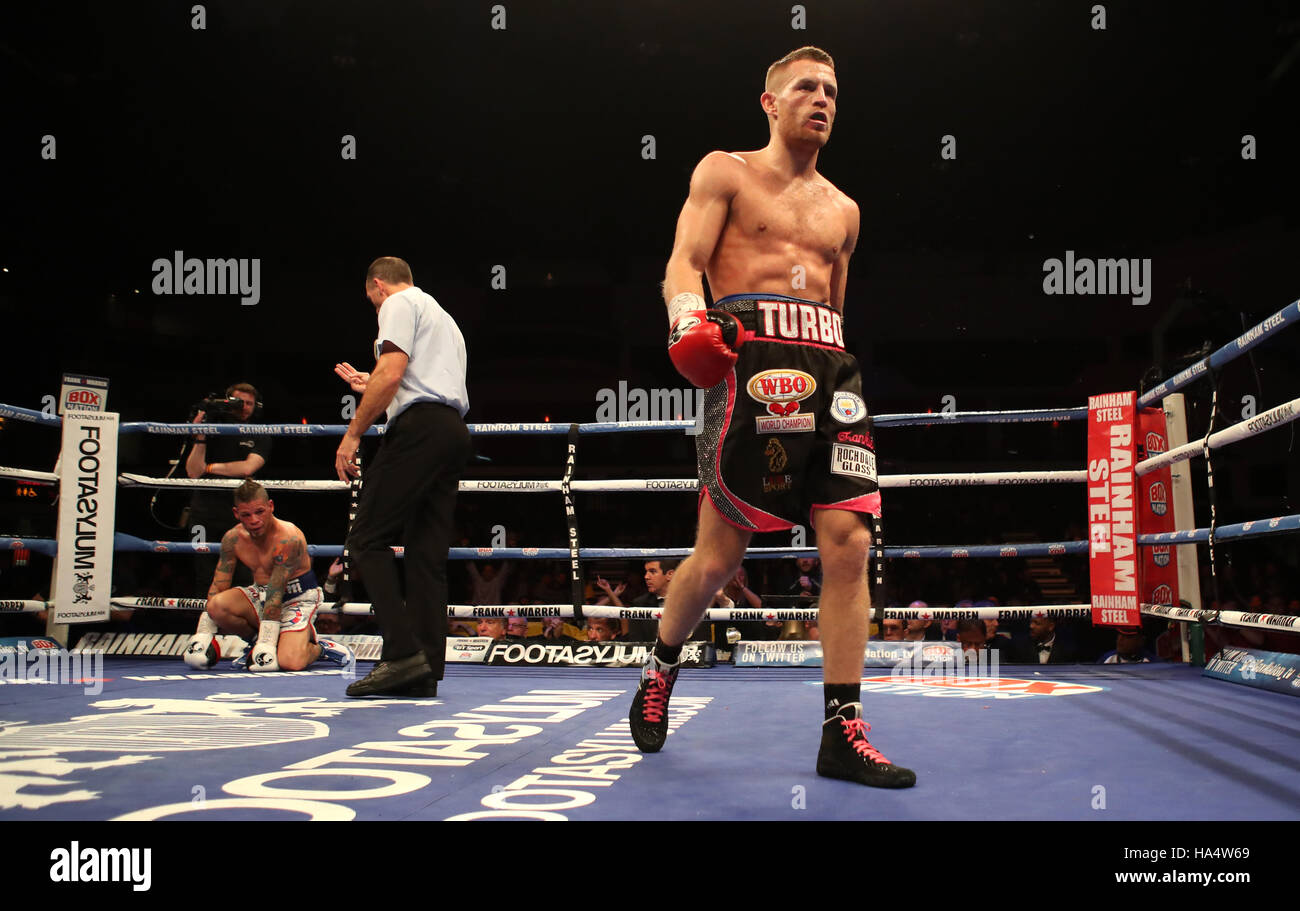 Terry Flanagan walks back to his corner after knocking Orlando Cruz ...