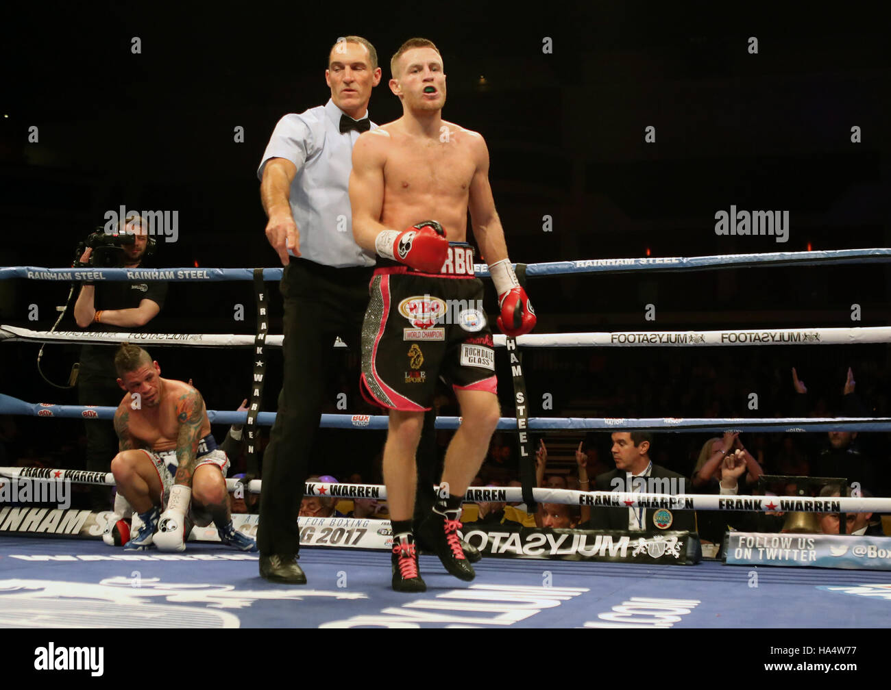 Terry Flanagan walks back to his corner after knocking Orlando Cruz ...