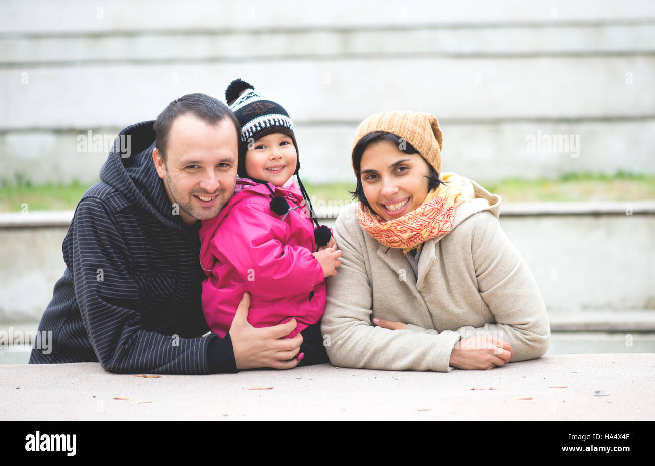Happy Family of Three Stock Photo - Alamy