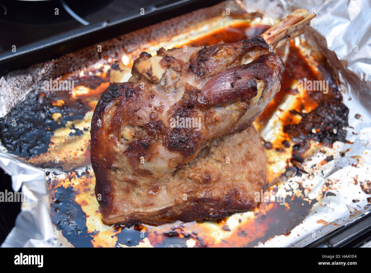 Side-view of baked lamb shoulder Stock Photo - Alamy
