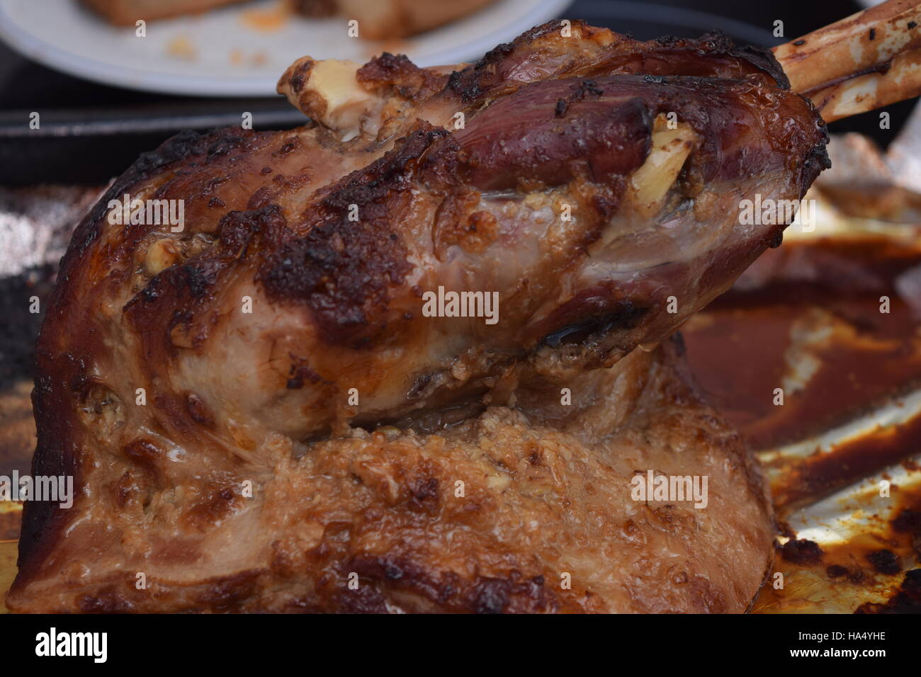 Lamb shoulder cooked in a kitchen Stock Photo - Alamy