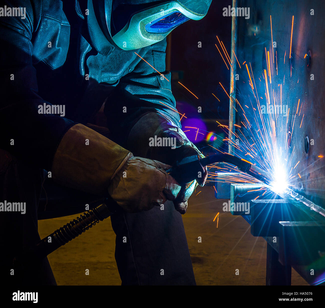welder, craftsman, erecting technical steel Industrial steel welder in ...