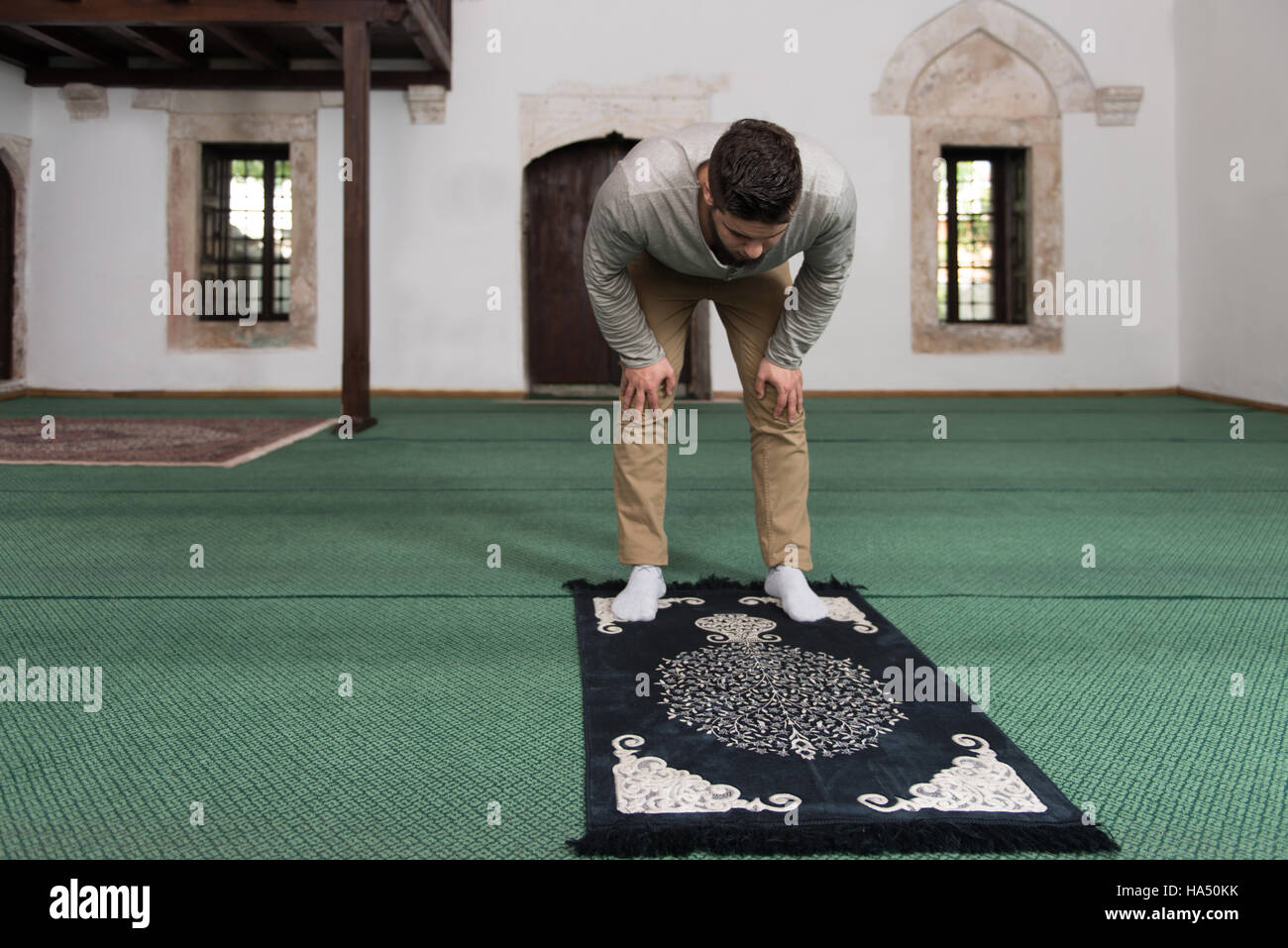 Humble Muslim Man Is Praying In The Mosque Stock Photo - Alamy