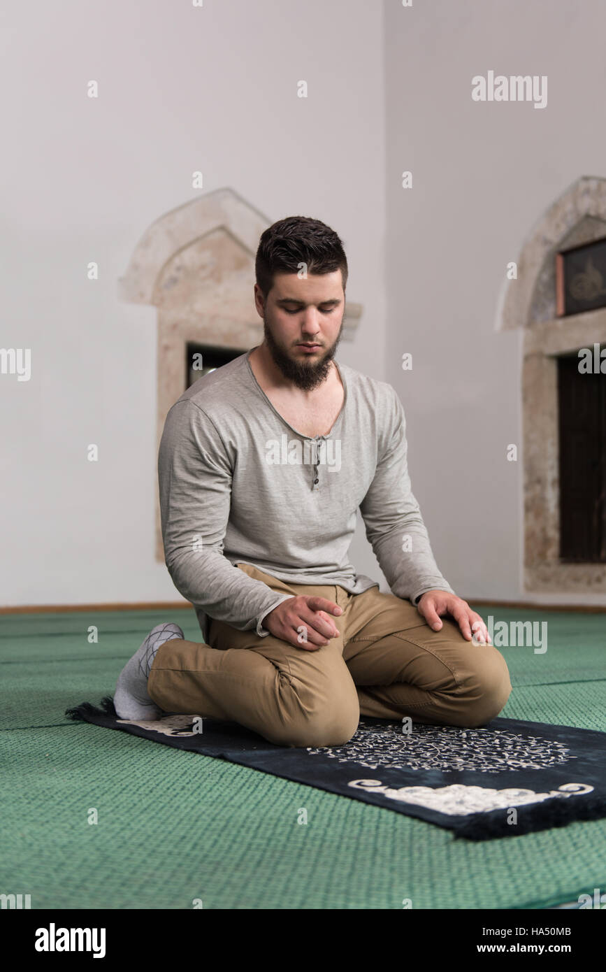Humble Muslim Man Is Praying In The Mosque Stock Photo - Alamy