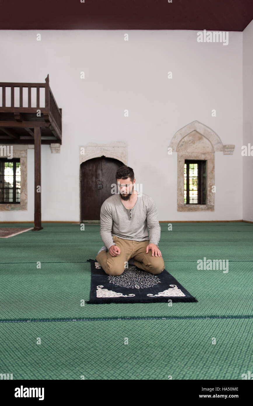 Humble Muslim Man Is Praying In The Mosque Stock Photo - Alamy