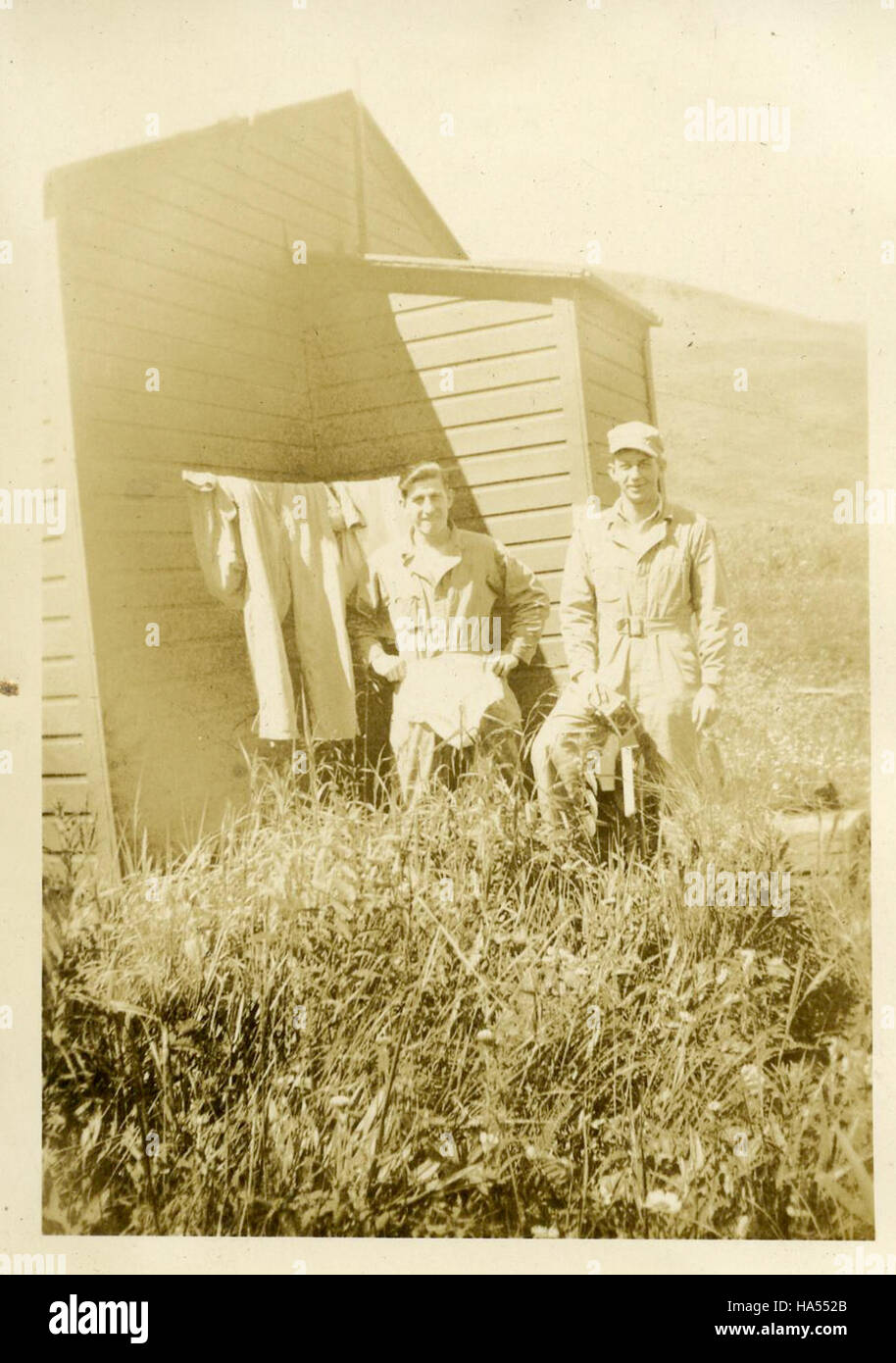 A historical image from Alaska’s National Parks depicts two individuals ...