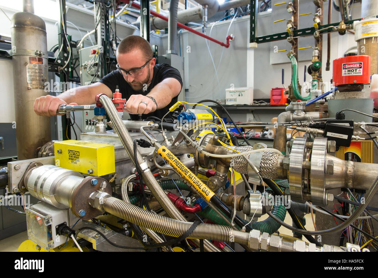 This illustration showcases an engine lab, emphasizing the Department ...