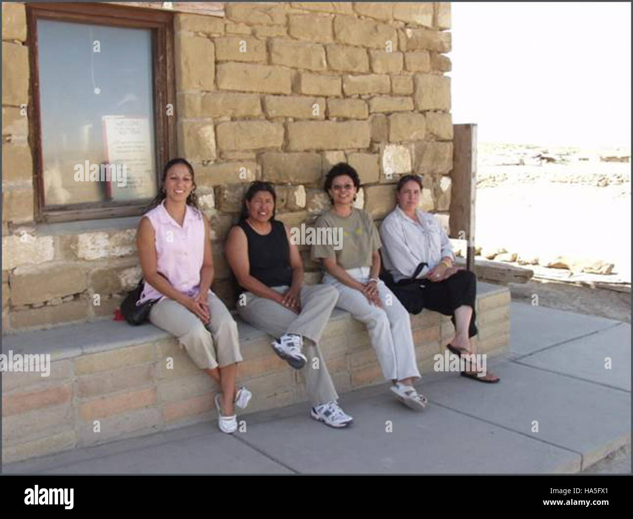The photo captures four interns at the Hopi Old Oraibi Village ...