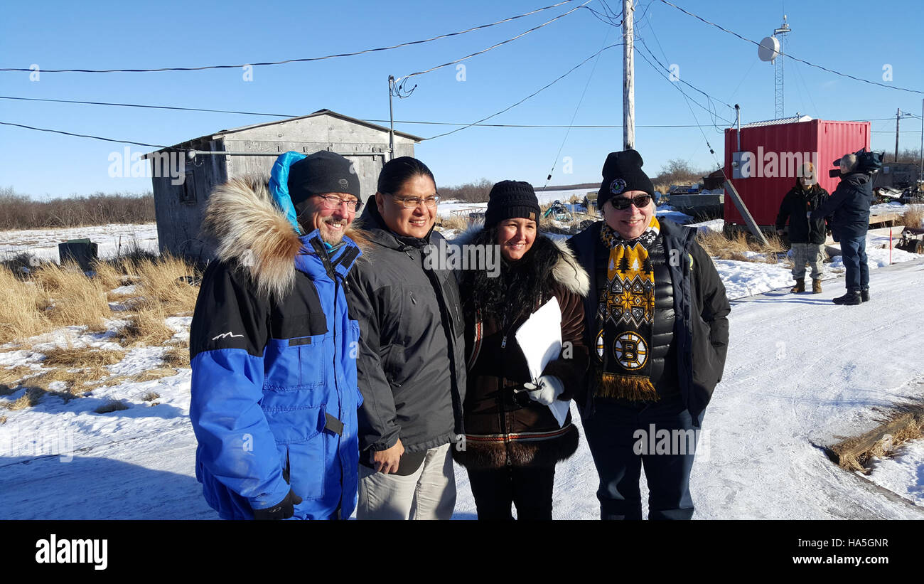 An image of Secretary Moniz and Director Deschene visiting the village ...