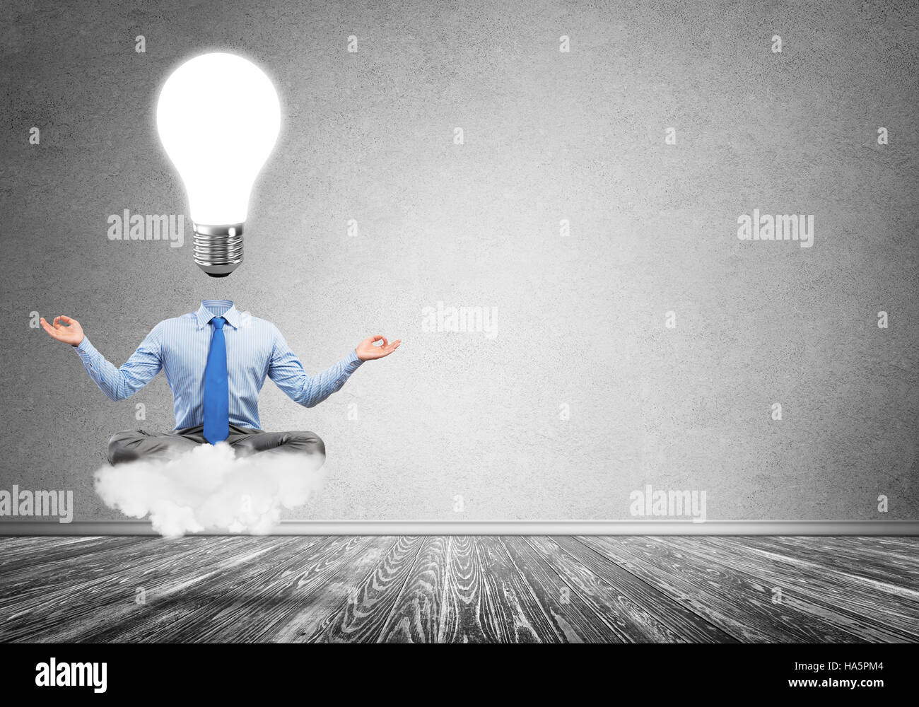 Businessman sitting in lotus pose and light bulb instead of his head ...