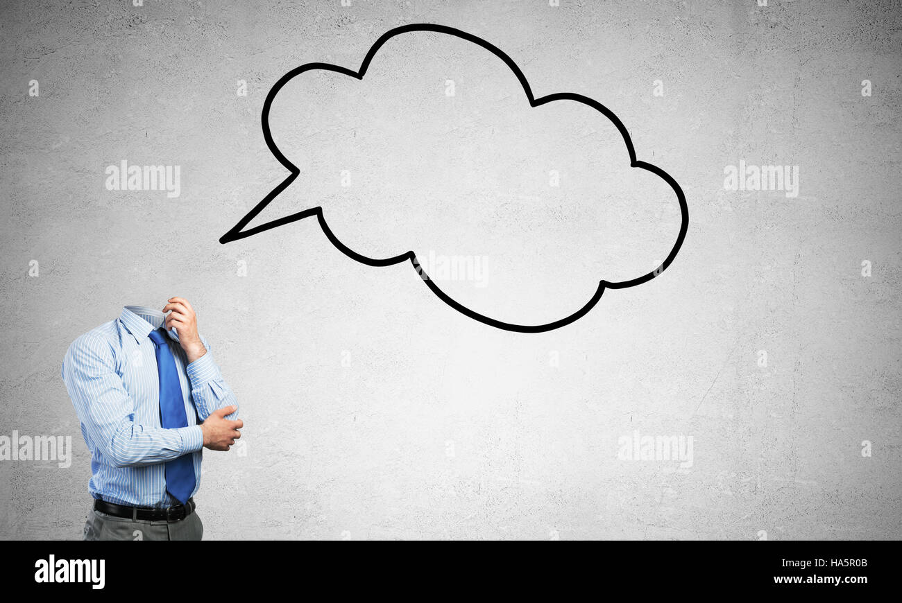 Headless businessman in empty room and blank speech bubble Stock Photo ...