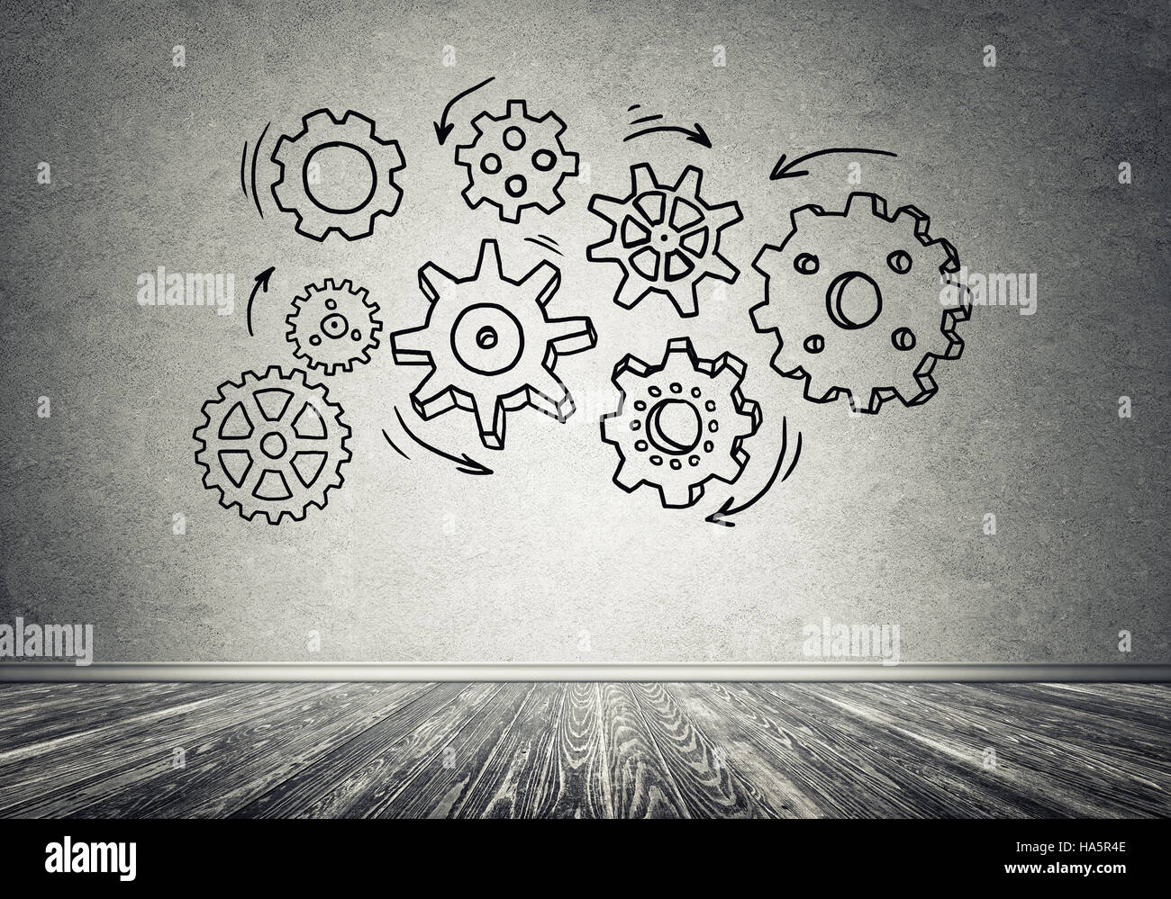 Gear hand drawn mechanism on gray wall Stock Photo - Alamy