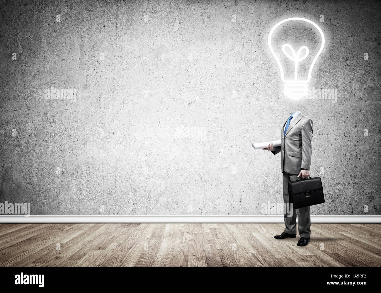 Faceless businessman with glowing light bulb instead of head Stock ...