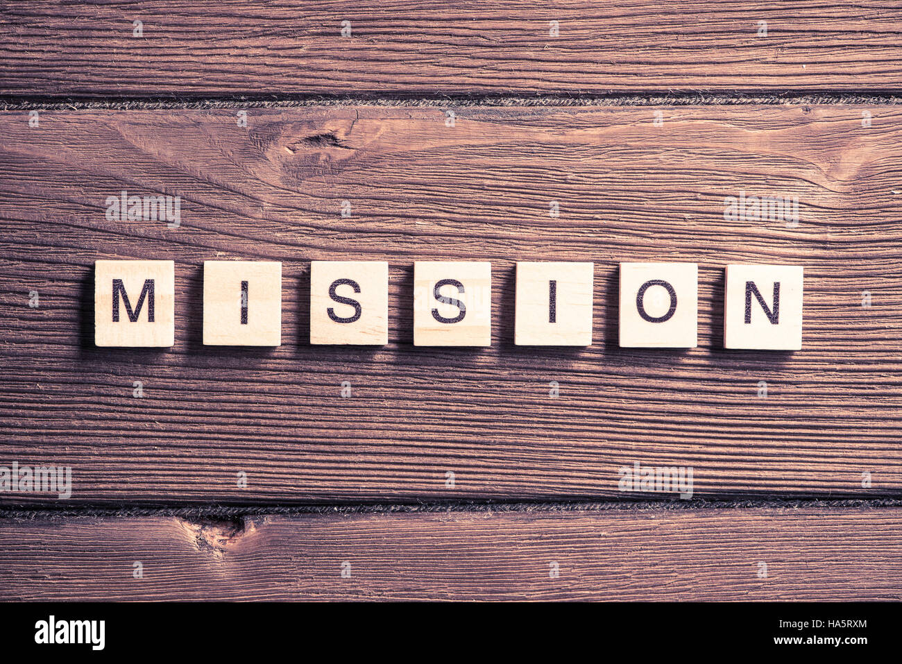 Business mission word collected of elements of wooden elements with the ...