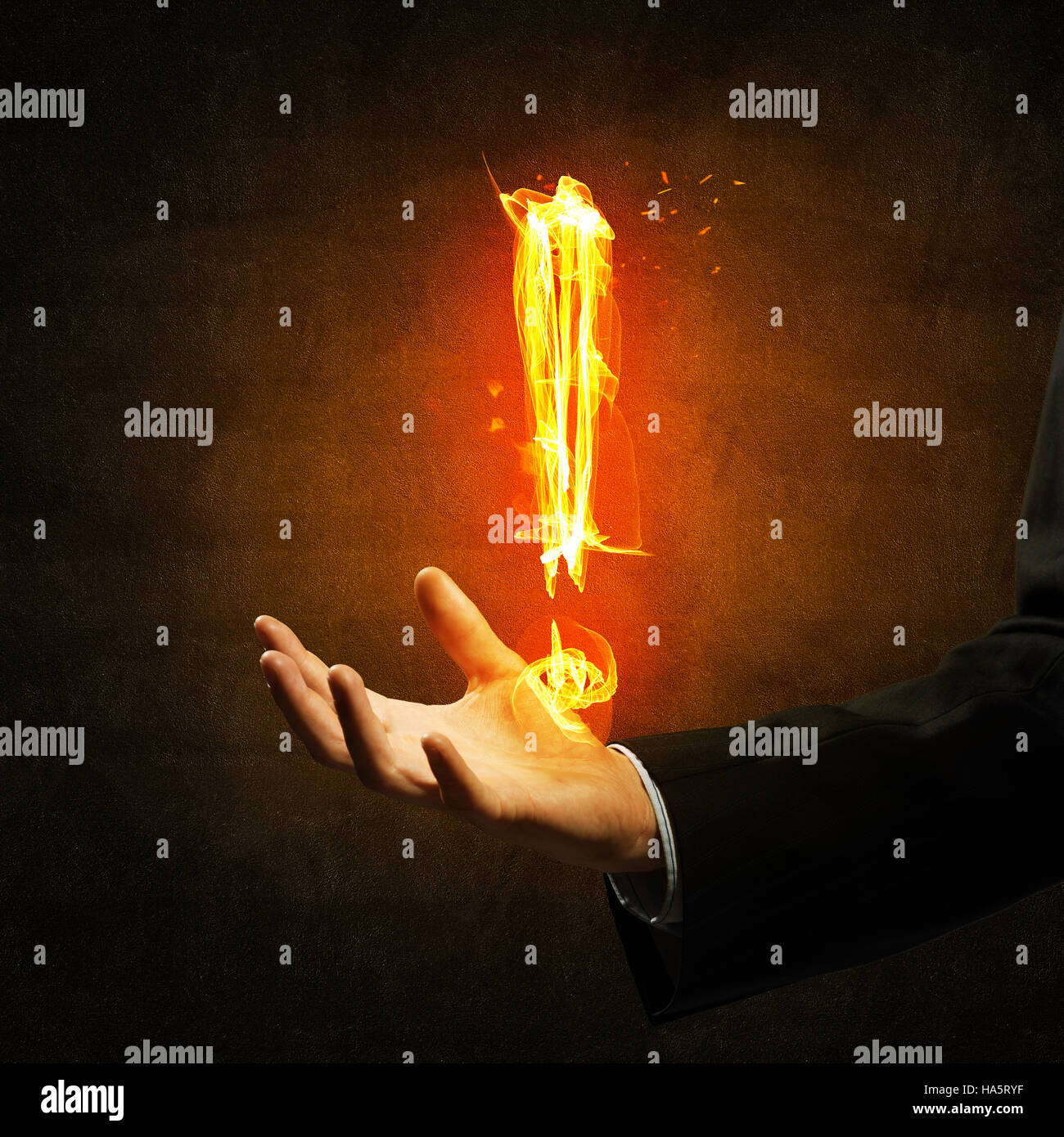 Glowing exclamation mark symbol in palm on dark background Stock Photo ...