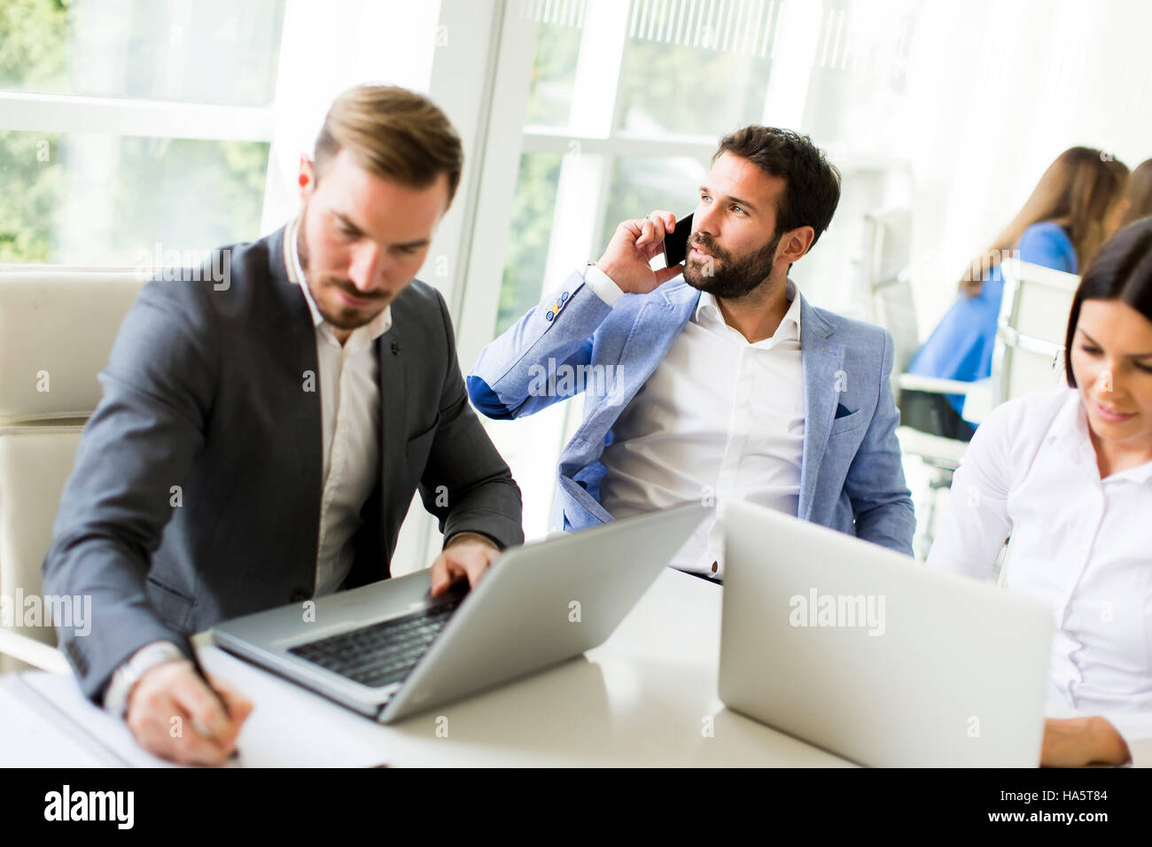 Team of young motivated successful people are on the business meeting ...