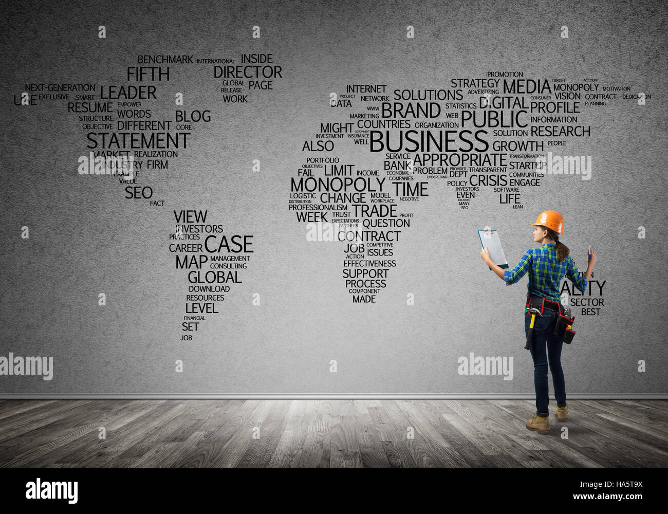 Female construction worker in room and globalization concept Stock ...