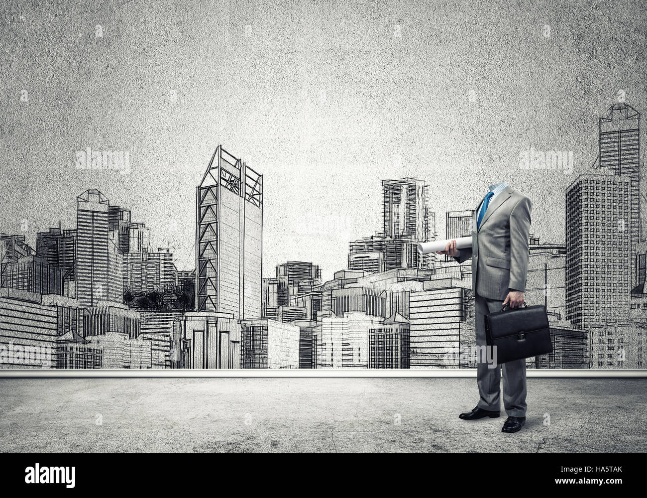Headless engineer man with papers in hand against construction ...