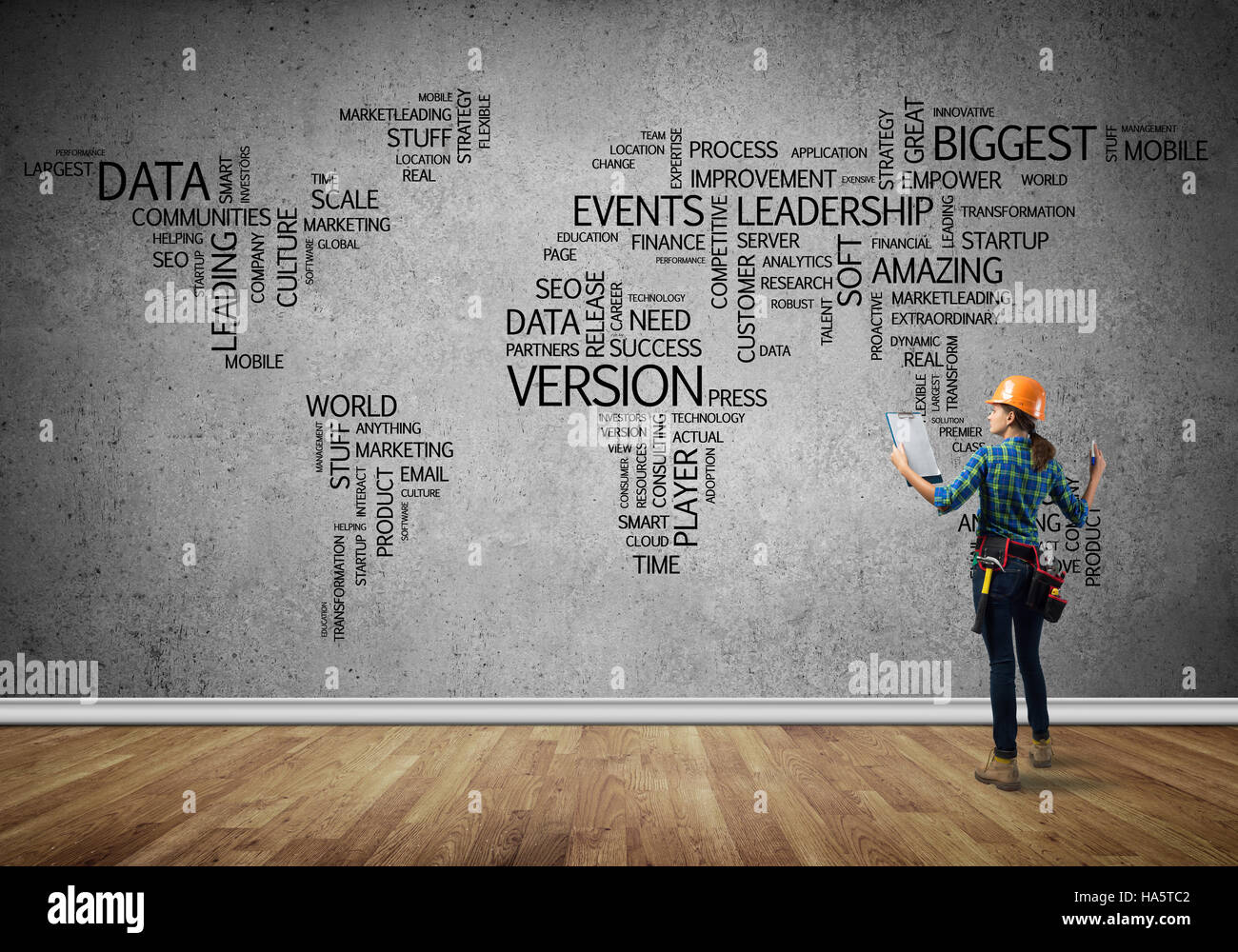 Female construction worker in room and globalization concept Stock ...