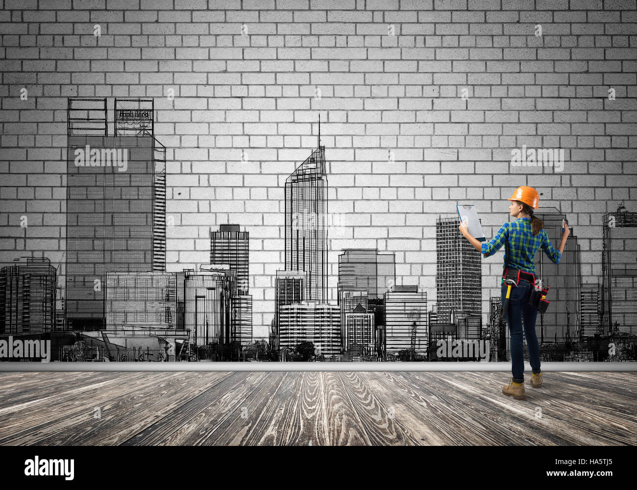 Back view of engineer woman with folder and sketches of construction ...