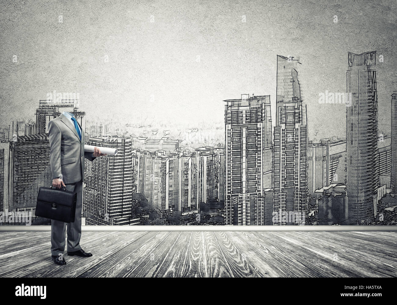 Headless engineer man with papers in hand against construction ...