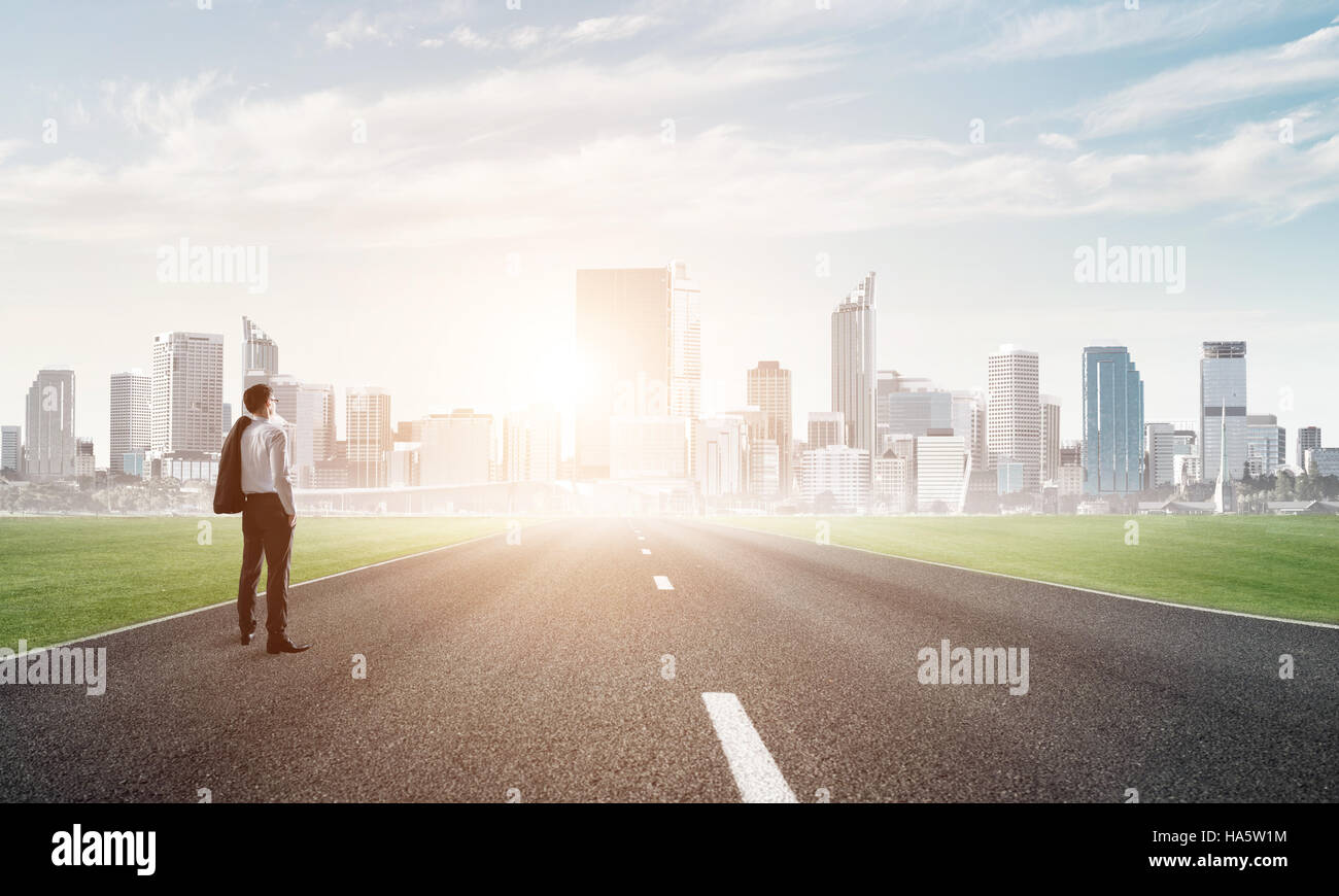 Man standing on freeway road hi-res stock photography and images - Alamy