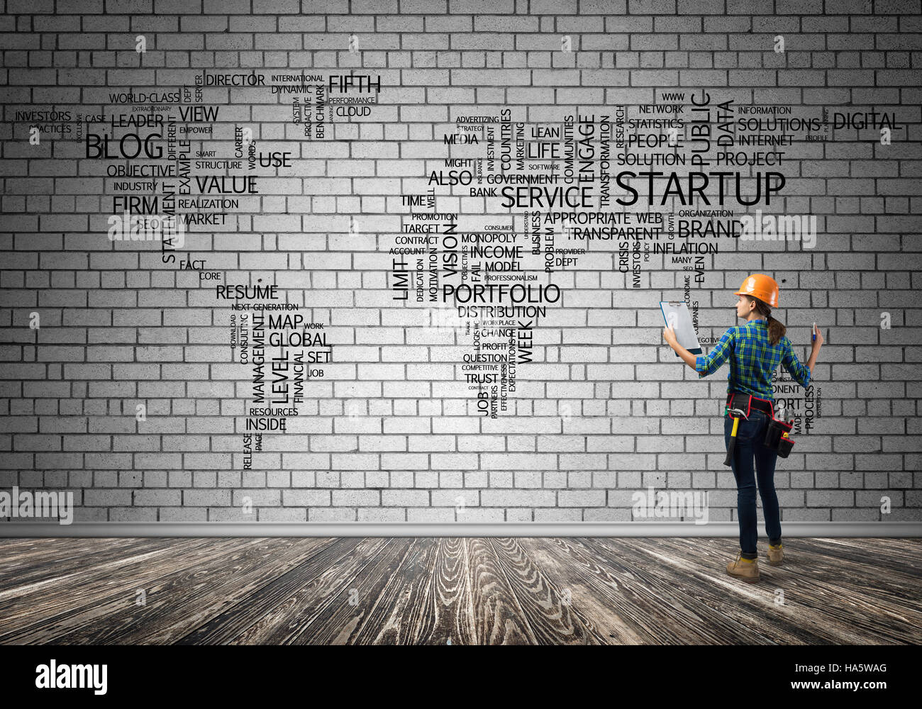 Female construction worker in room and globalization concept Stock ...