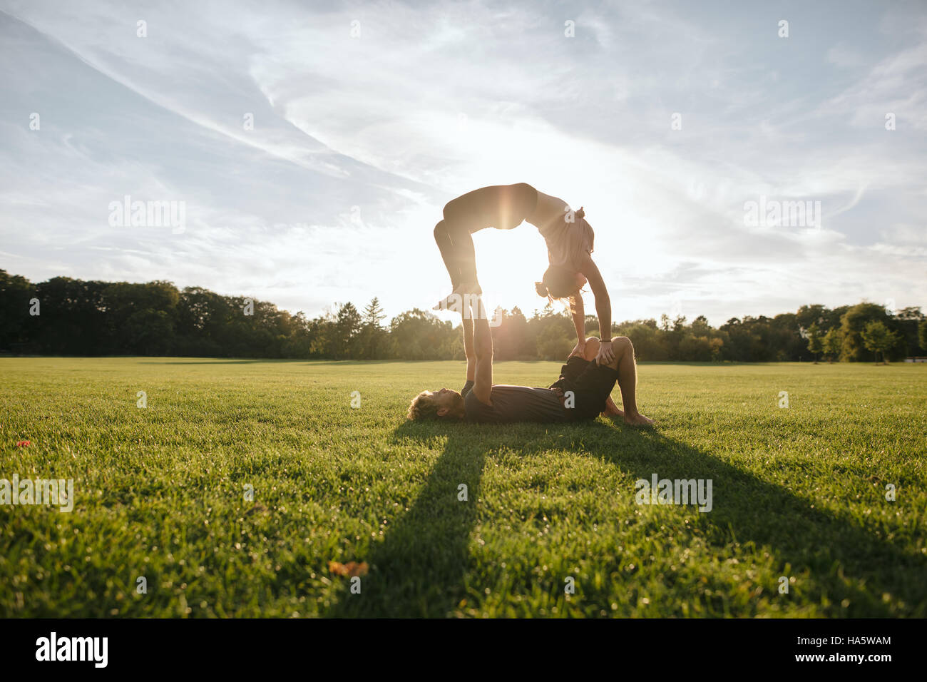 Acrobatic pose hi-res stock photography and images - Alamy